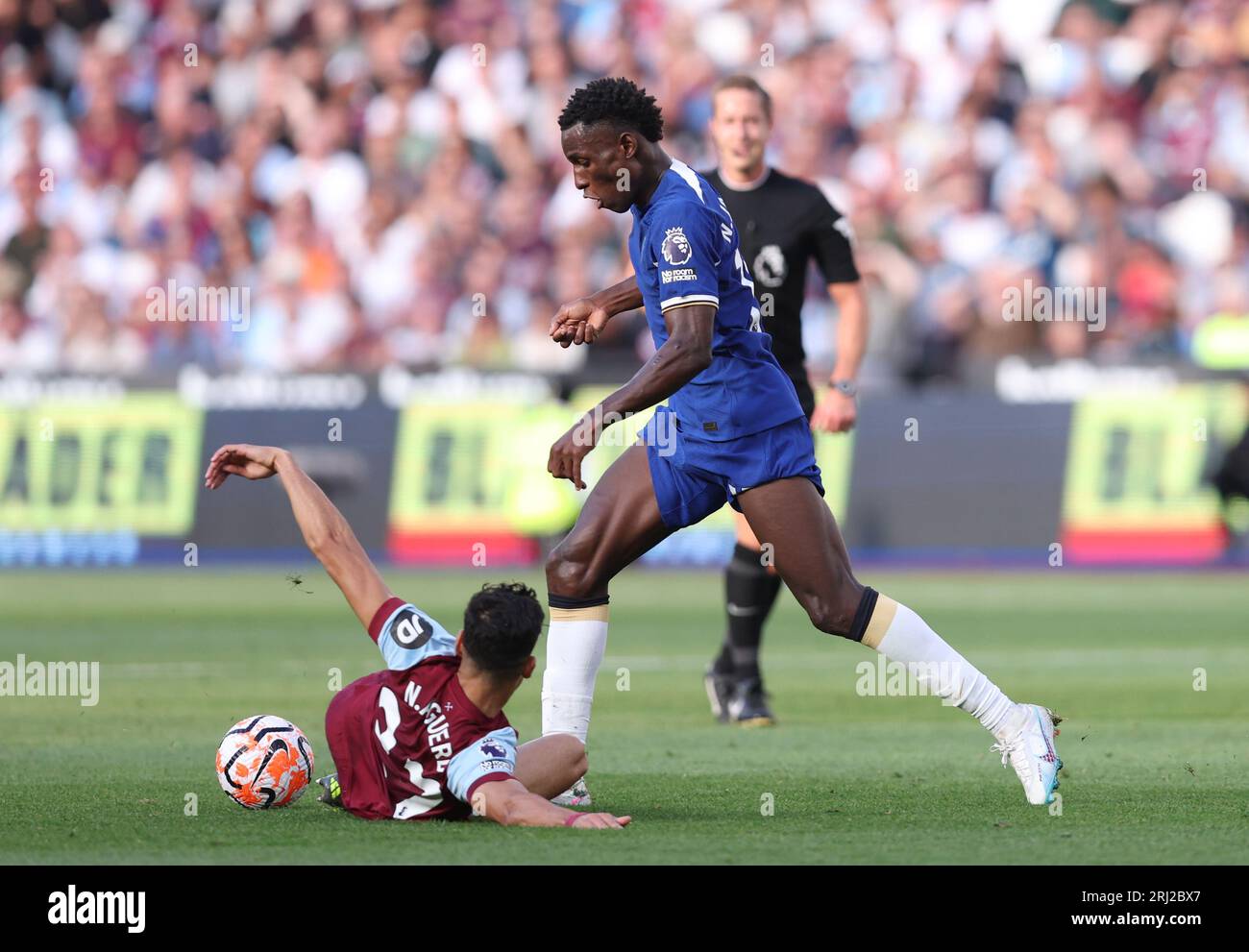 London, UK. 20th Aug, 2023. Nayef Aguerd of West Ham United fouls ...