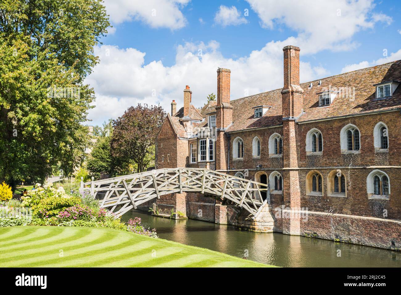 Mathematical Bridge in Cambridge seen over a pristine lawn on a bright ...