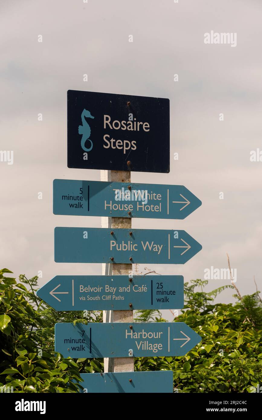Herm, Channel Islands. 11 June 2023. Blue painted signs point to ...