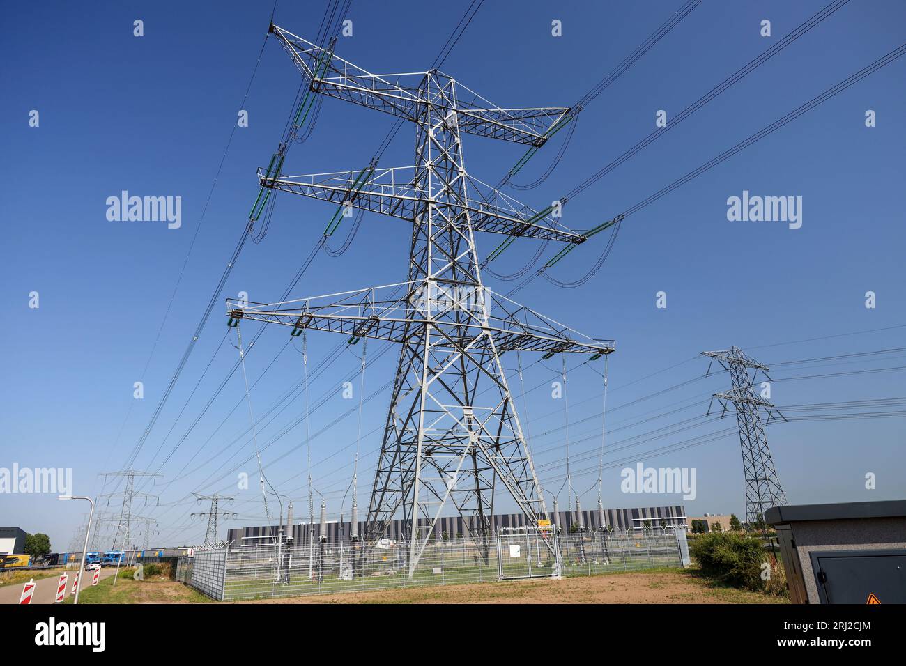 High voltage powerlines of Tennet at powerstation Hessenweg in Zwolle ...