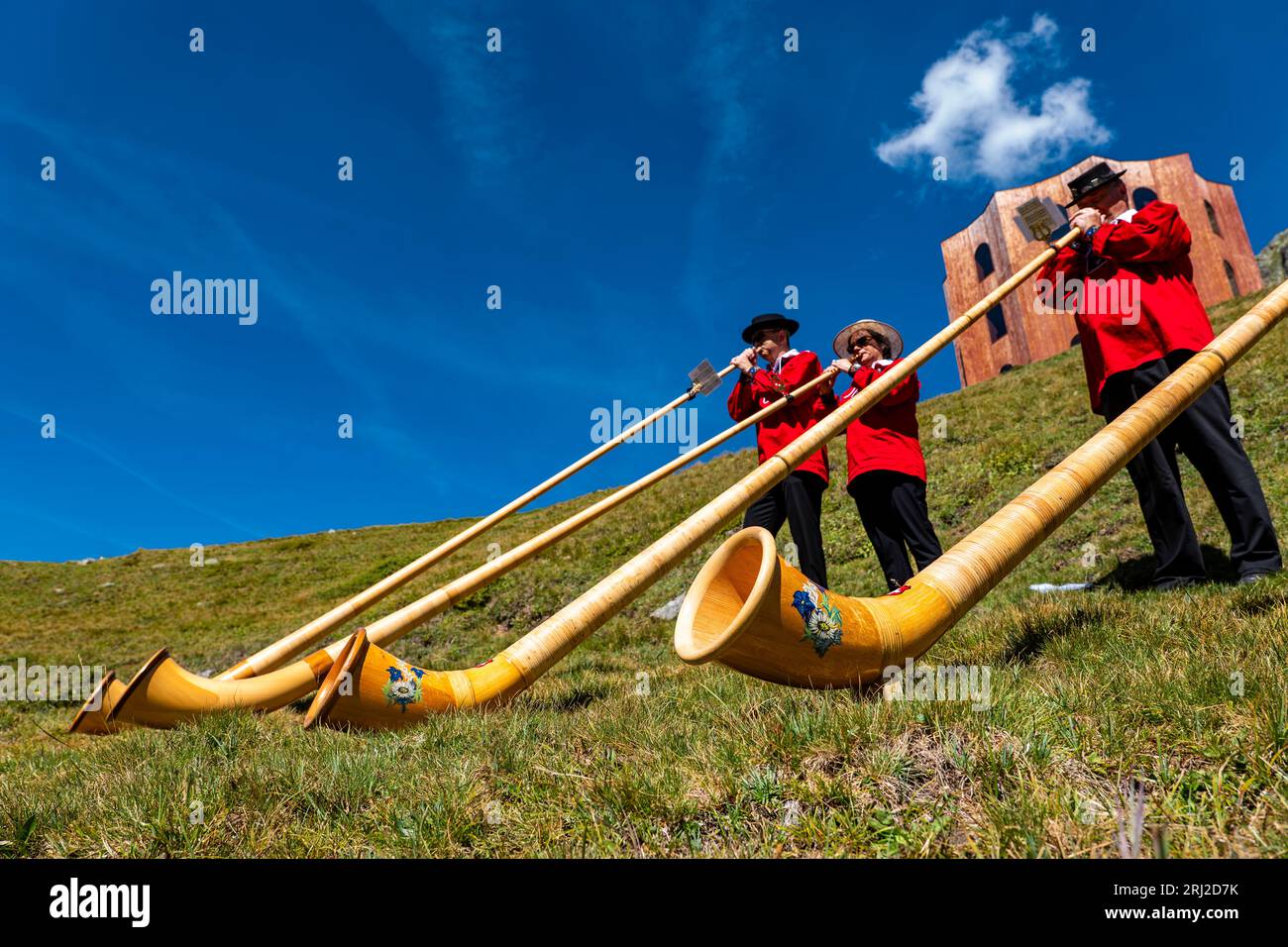 Julierpass (Switzerland) 08/19/2023: A group of typical musicians of ...