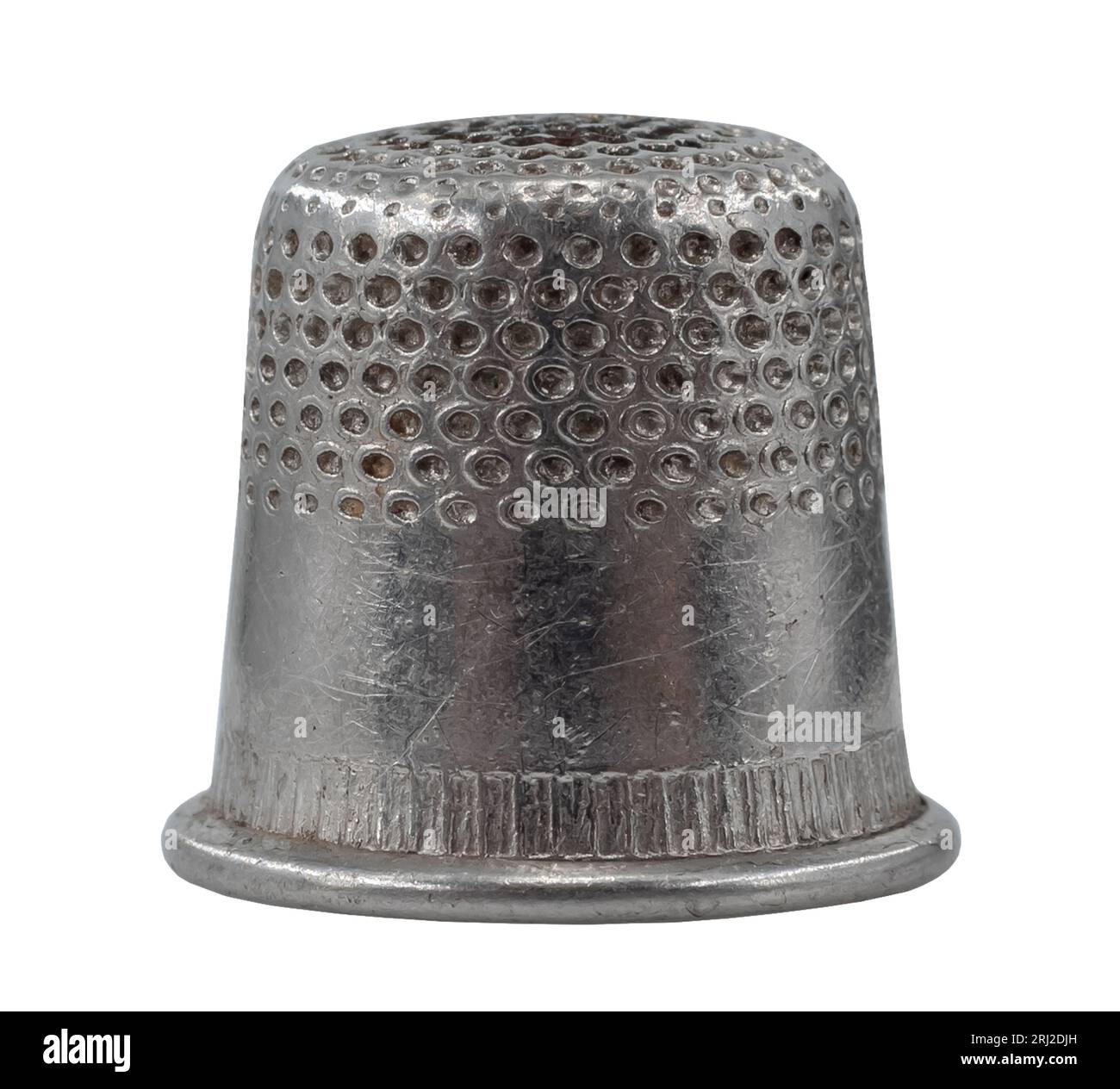 Thimble for cutting and sewing on a white background close-up. Sewing ...