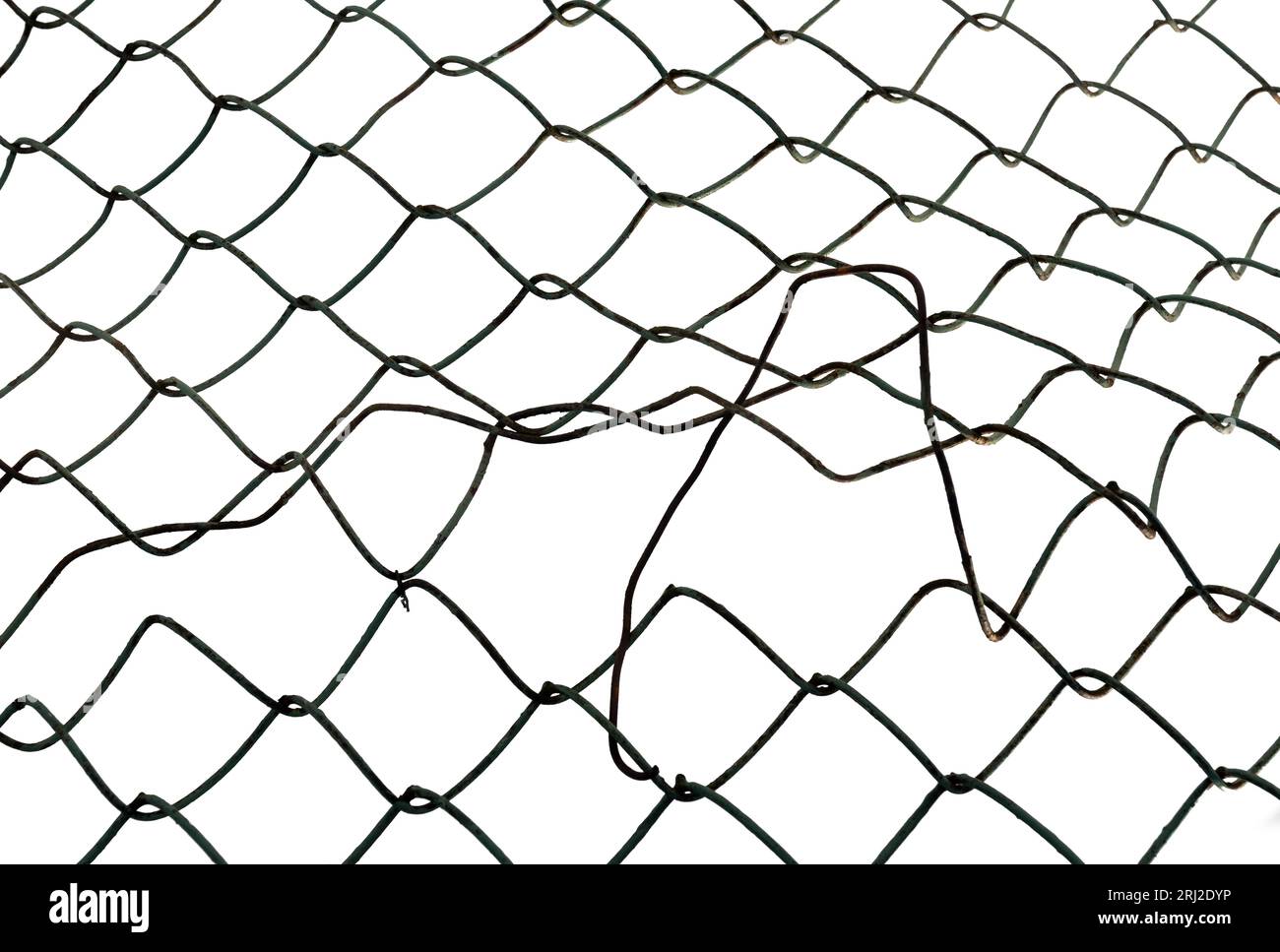 The texture of the metal mesh. Torn, destroyed, broken metal mesh on a ...