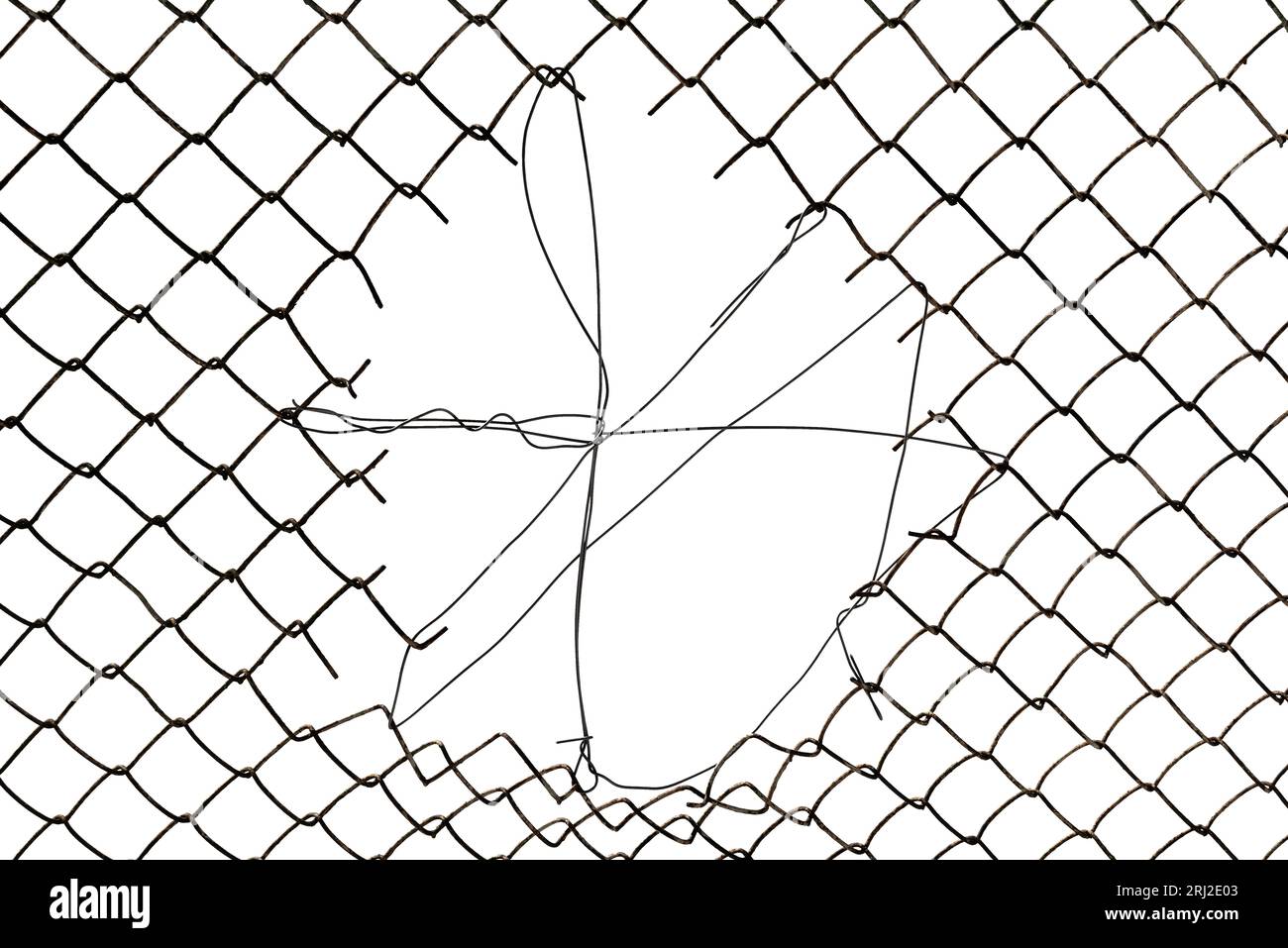 The texture of the metal mesh. Torn, destroyed, broken metal mesh on a ...