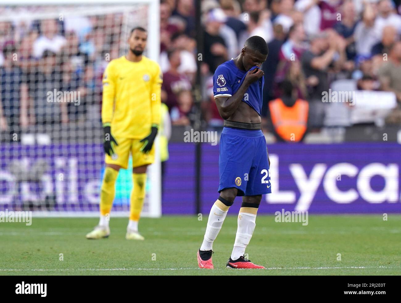 Chelsea's Moises Caicedo (right) dejected following the Premier League ...