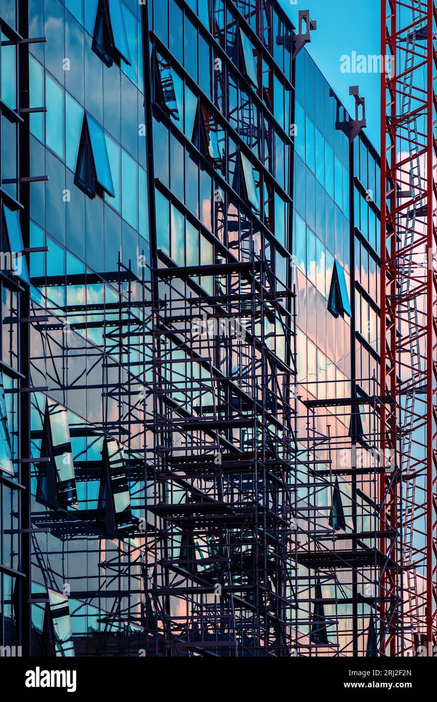 Reconstruction of modern office building with glass facade ...