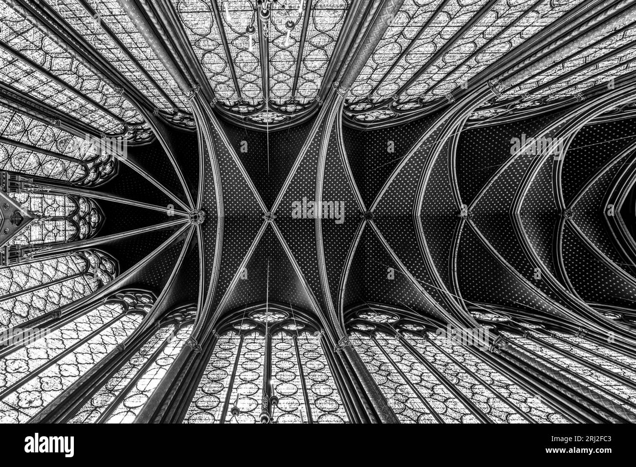 Monumental interior of Sainte-Chapelle with stained glass windows ...