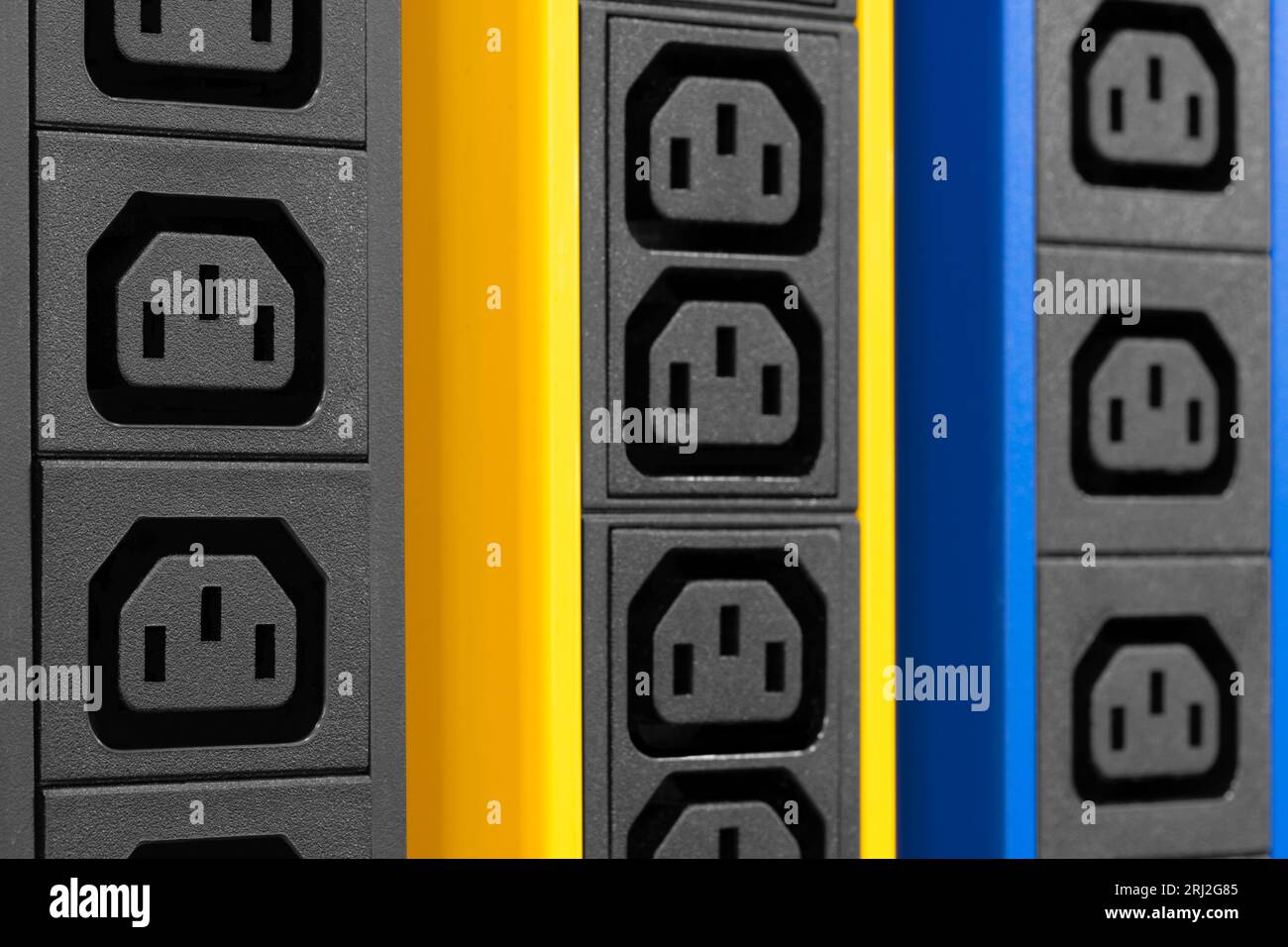 Electricity sockets IEC 60320 C13 in the server rack. Electicity ...