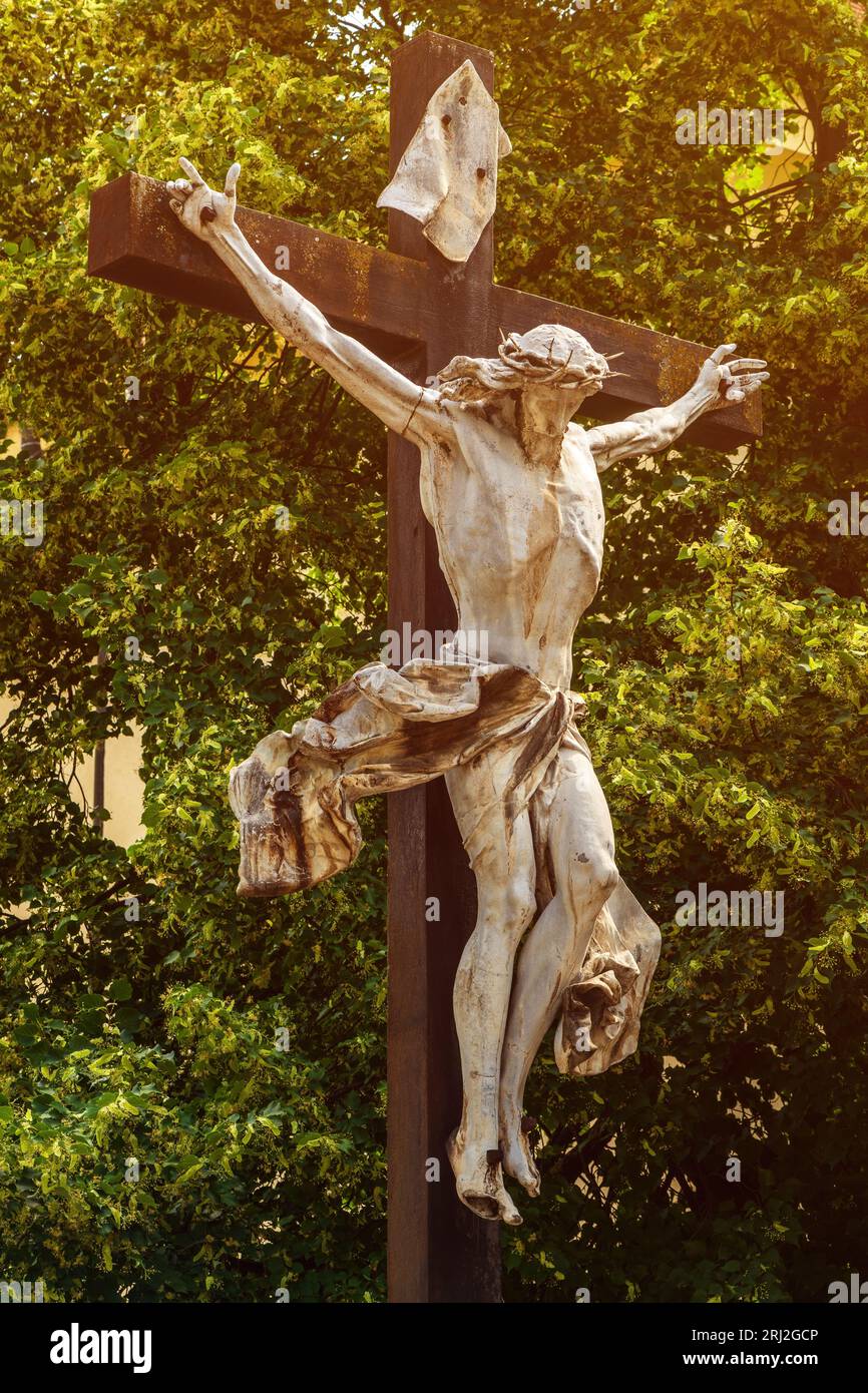 Statue of Jesus Christ crucified on the cross, selective focus Stock Photo - Alamy