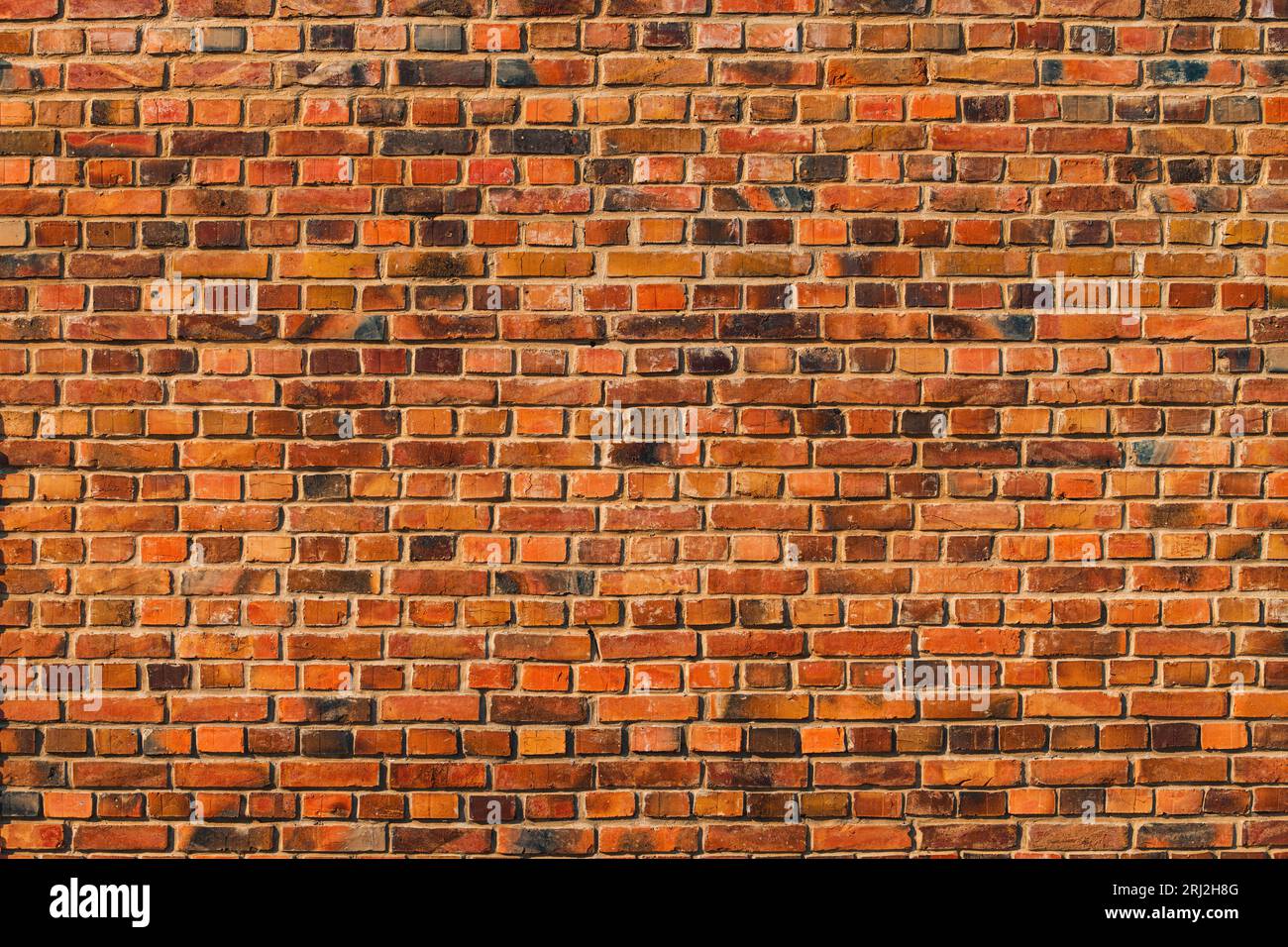 Brickwall background, rustic pattern of orange and brown bricks ...