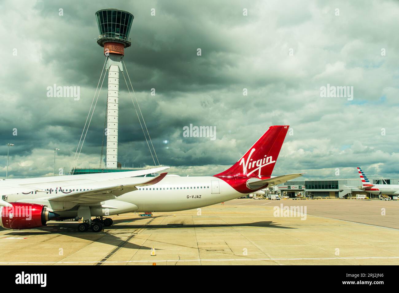 Virgin aircraft with Heathrow air traffic control tower at London ...