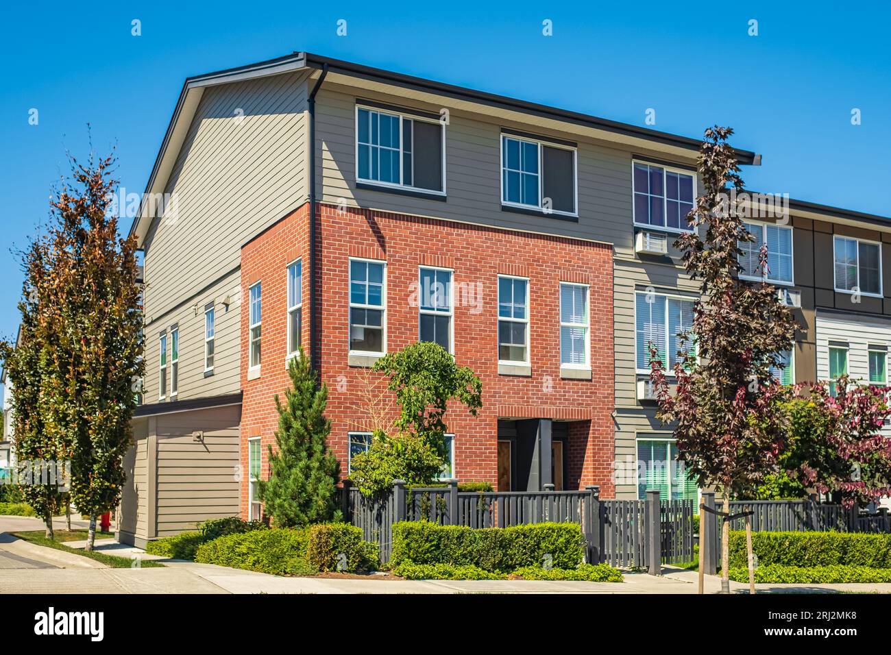 Brand new apartment building on summer. Canadian modern residential ...