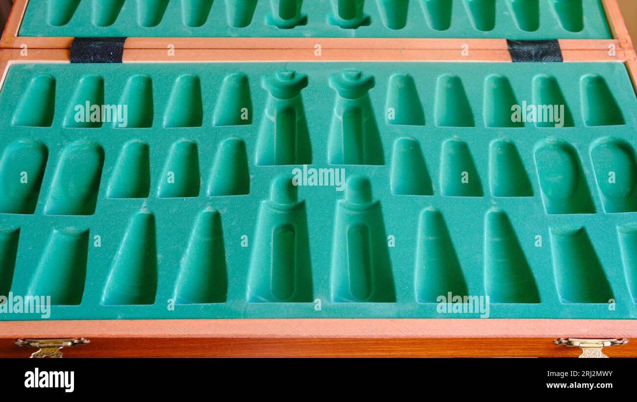 No chess pieces from the green box at the back of the chessboard Stock ...