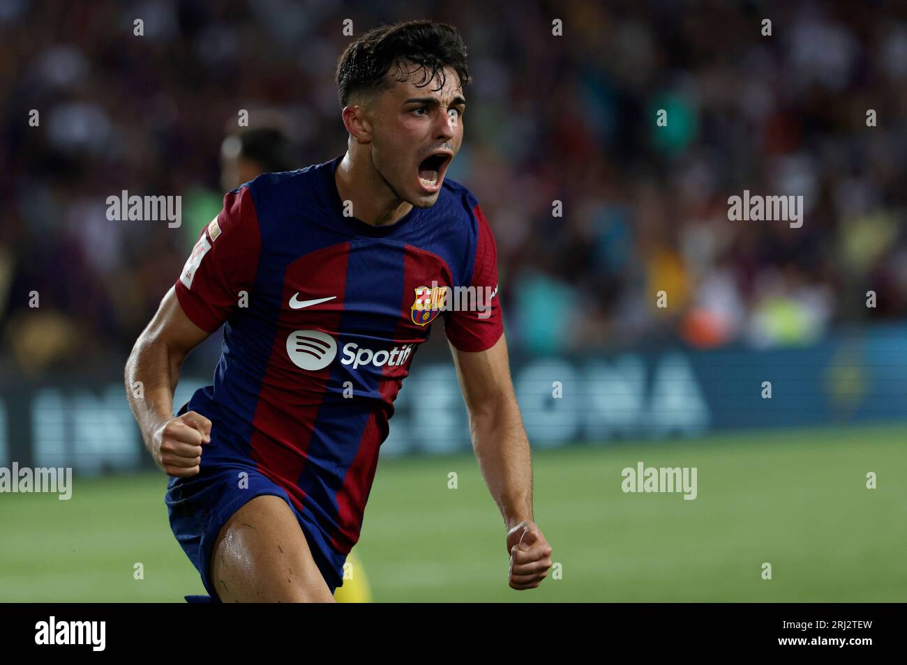 Barcelona's Pedri celebrates after scoring his side's opening goal ...