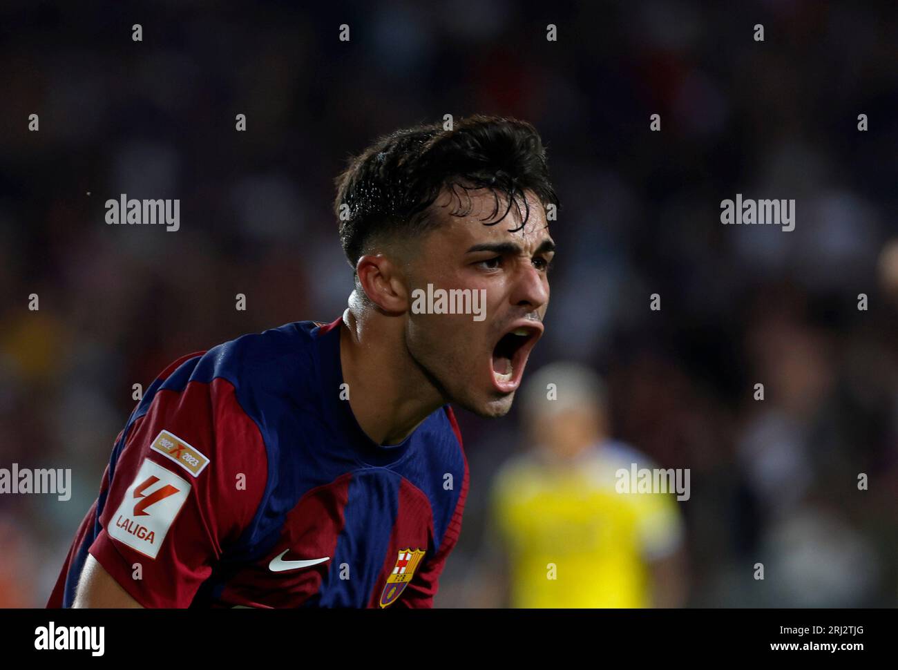 Barcelona's Pedri celebrates after scoring his side's opening goal ...