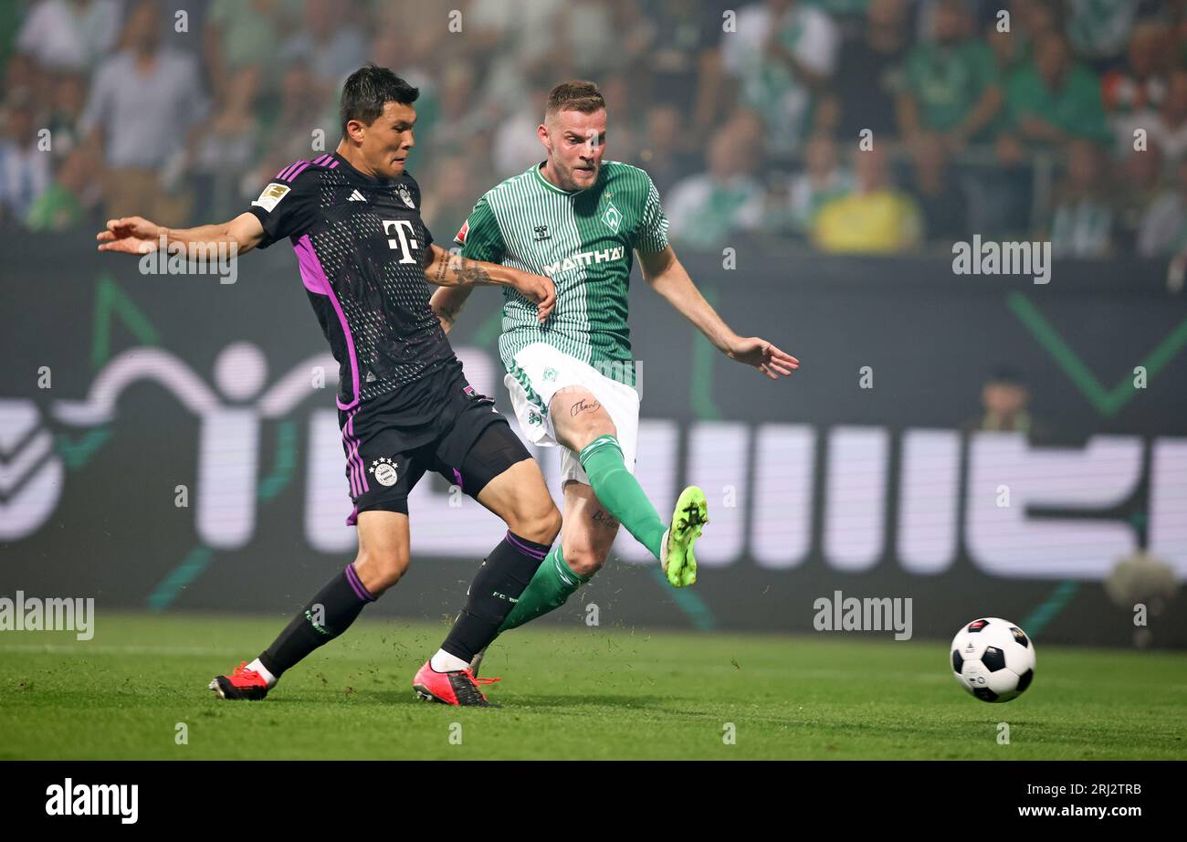 Min Jae Kim of FC Bayern Muenchen Marvin Ducksch of Werder Bremen ...