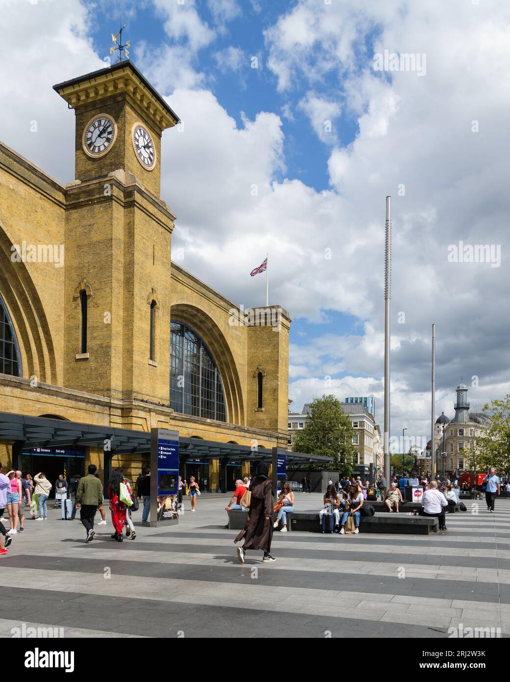 London, UK - July 29, 2023; Kings Cross Square with travellers in ...