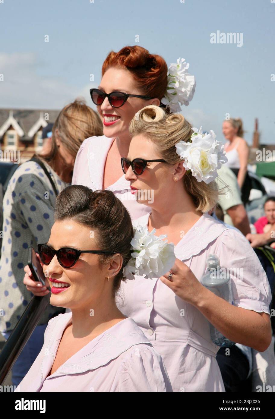 A view of the Bluebirds Trio Vintage Singers, mingling in the crowd, at ...