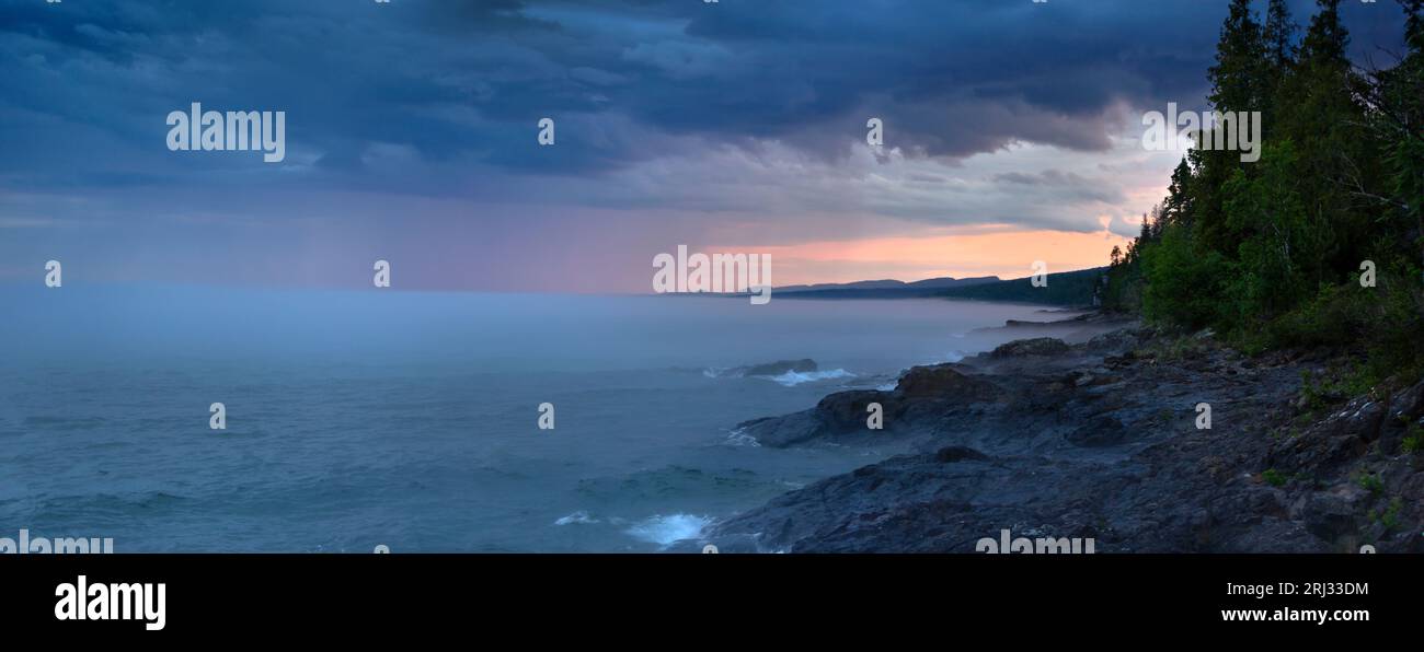 Dark storm clouds, rain, and fog along the North Shore of Lake Superior ...