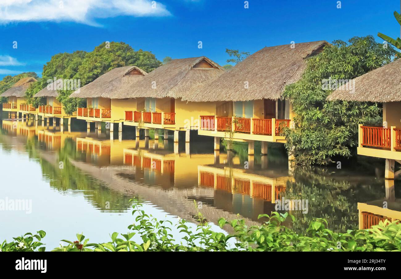 Beautiful idyllic tourist resort with bungalows on stilts on the ...