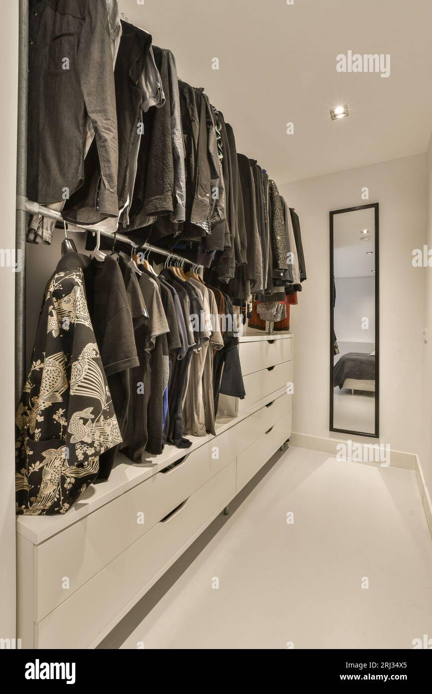 Person walk in wardrobe hi-res stock photography and images - Alamy