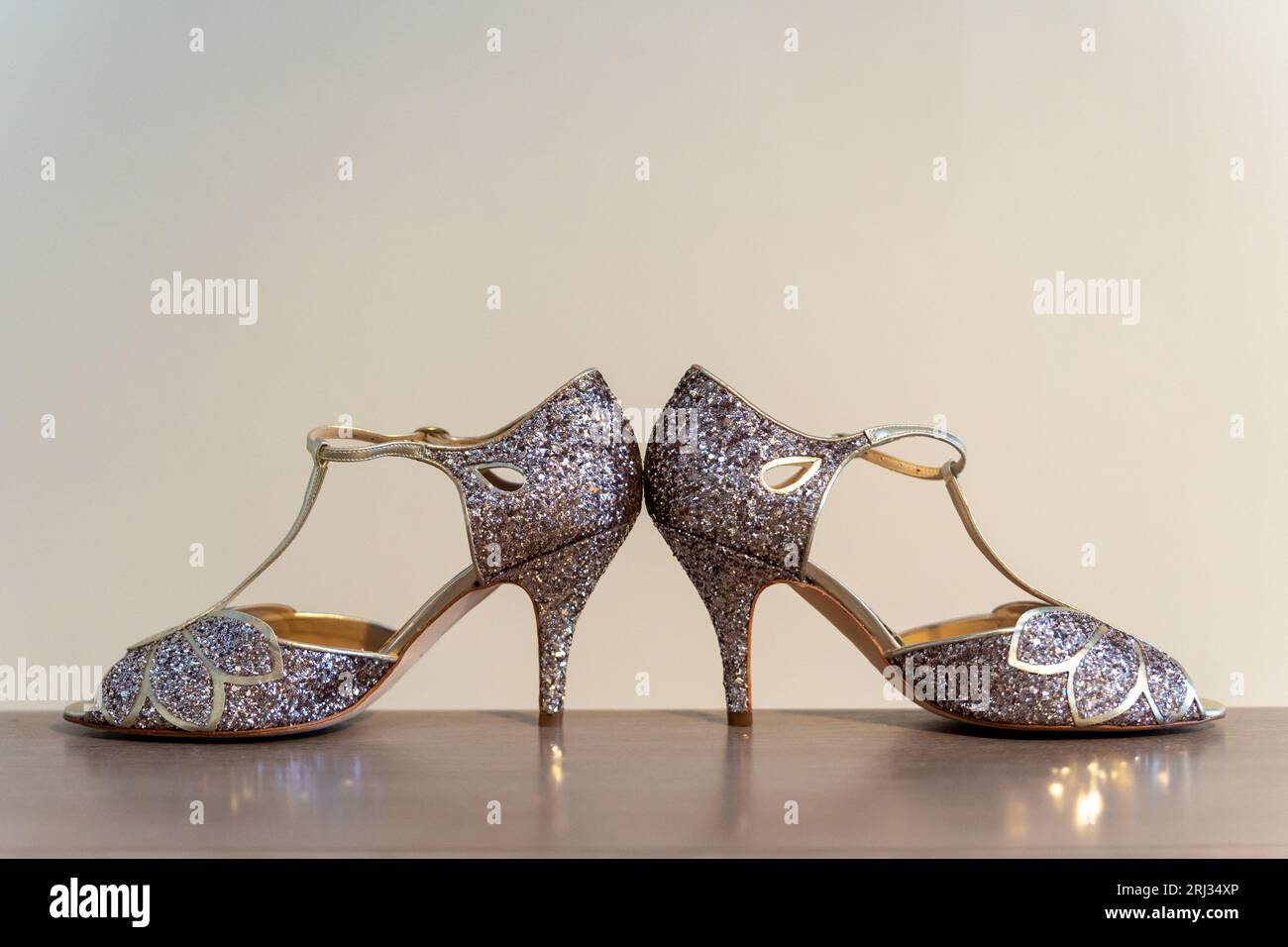 Pair of fashionable shiny shoes isolated on white background Stock ...