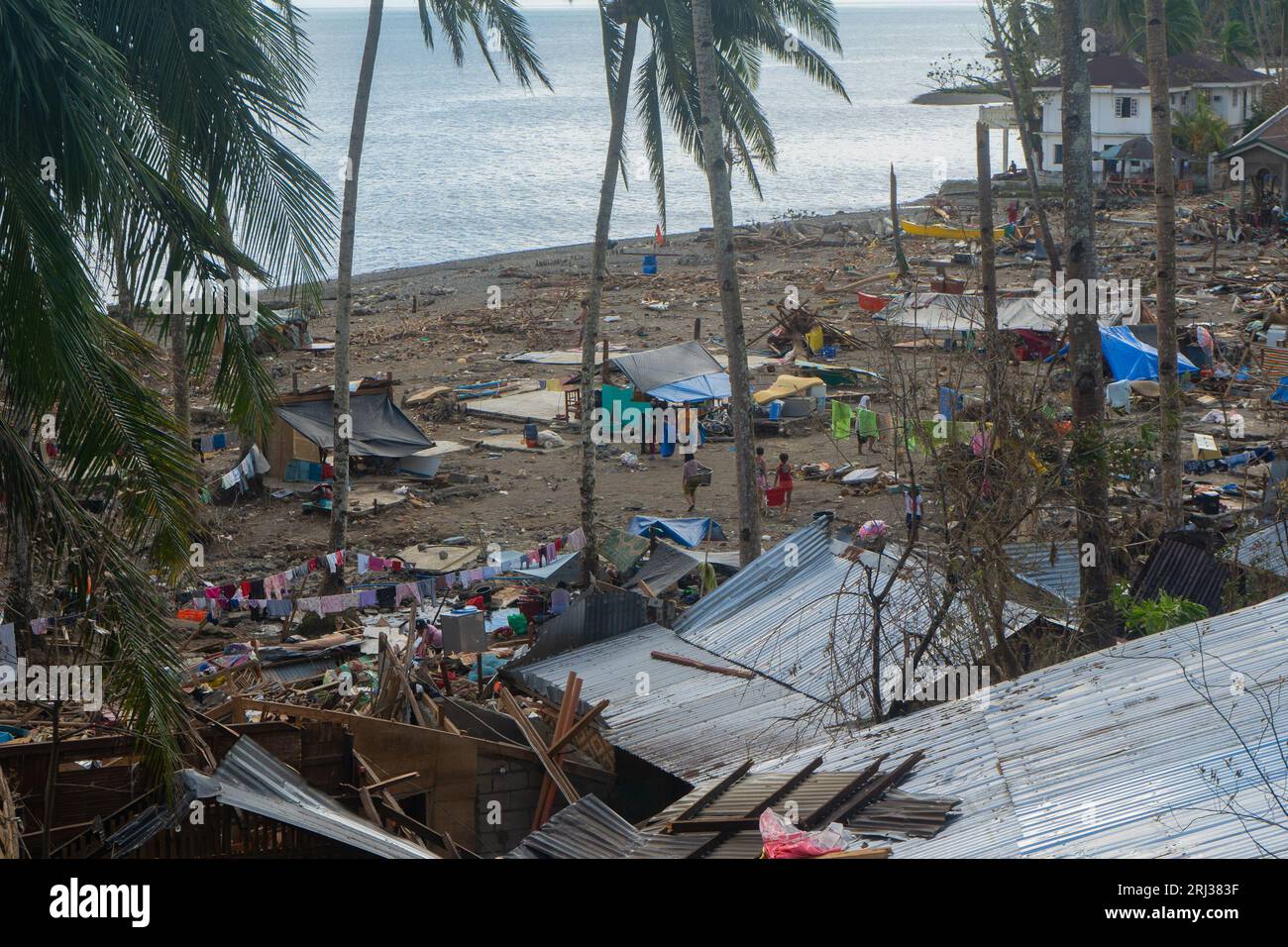 Aftermath of Typhoon Odette (Rai) in a coastal village in Southern ...