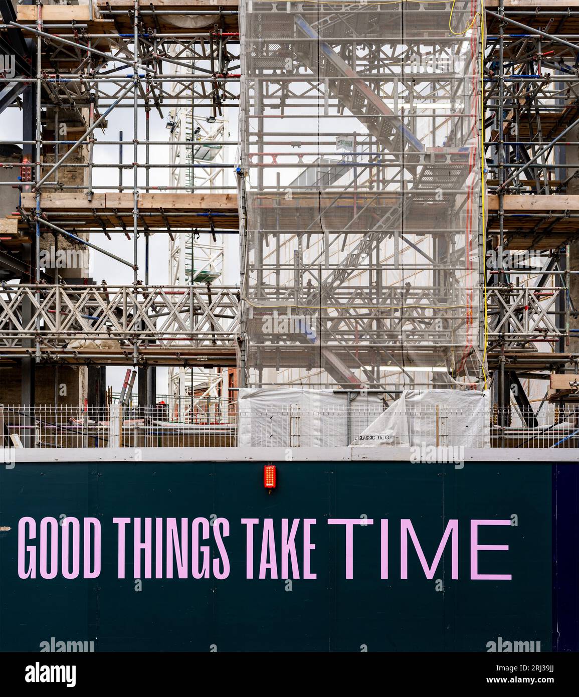 Scaffolding outside a large building project near Olympia, London Stock ...