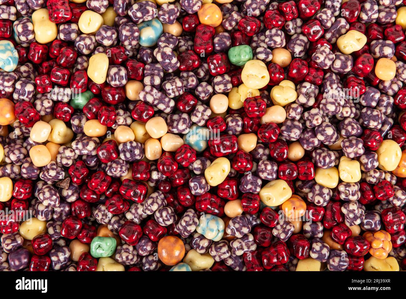 Milk chocolate candies in shell with jelly sugar gums and liquorice ...