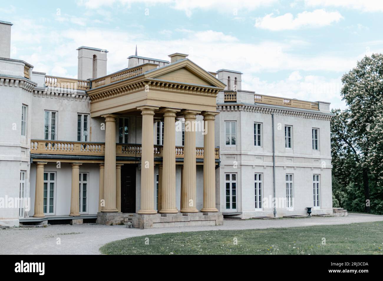 An Old classical greek roman European mansion with doric columns Stock ...