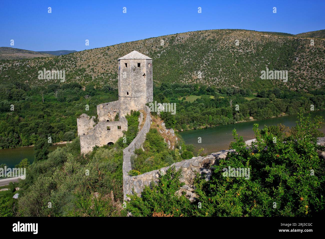 The medieval ruins of a castle tower with ramparts at Pocitelj, Bosnia ...