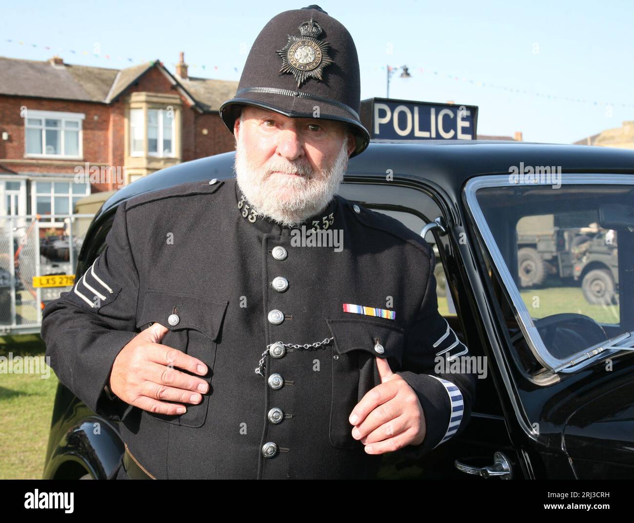 A police sergeant and his vintage motor vehicle, at the Lytham 1940's ...