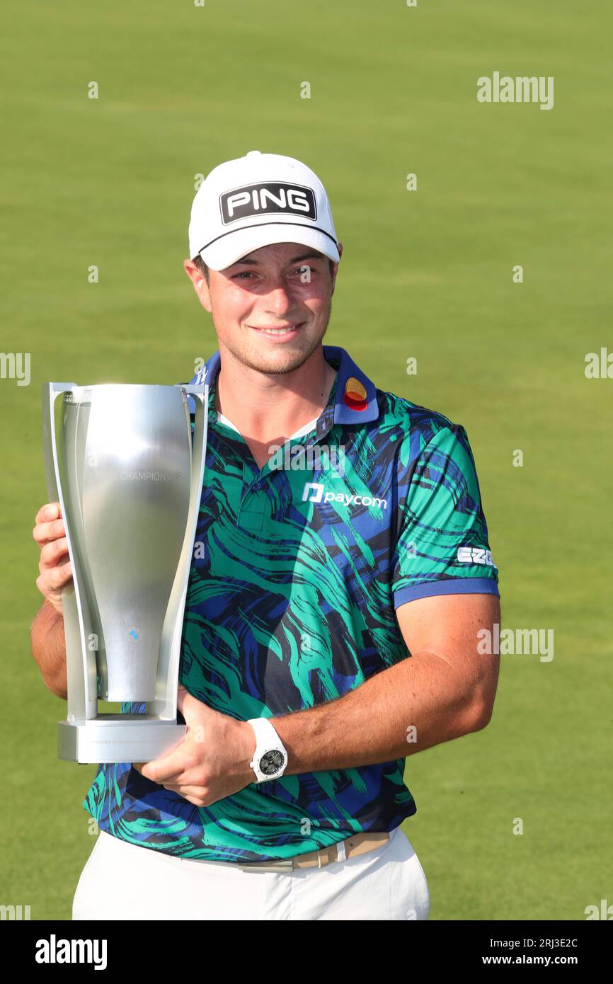 OLYMPIA FIELDS, IL - AUGUST 20: PGA golfer Viktor Hovland poses with the BMW Championship Trophy ...