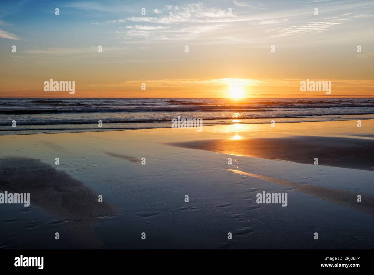 Atlantic ocean sunset with surging waves at Fonte da Telha beach ...