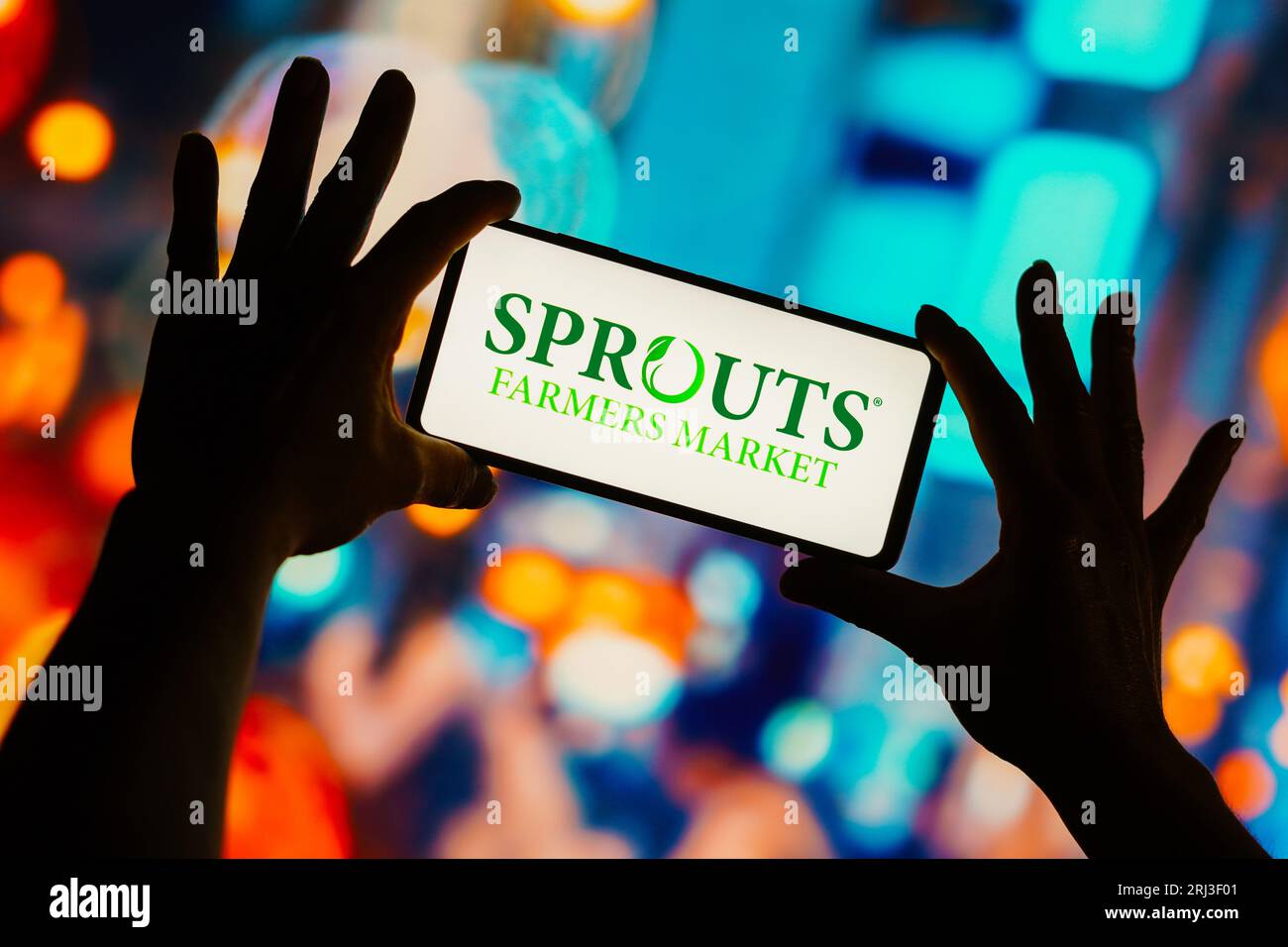In this photo illustration, the Sprout Farmers Market logo seen ...