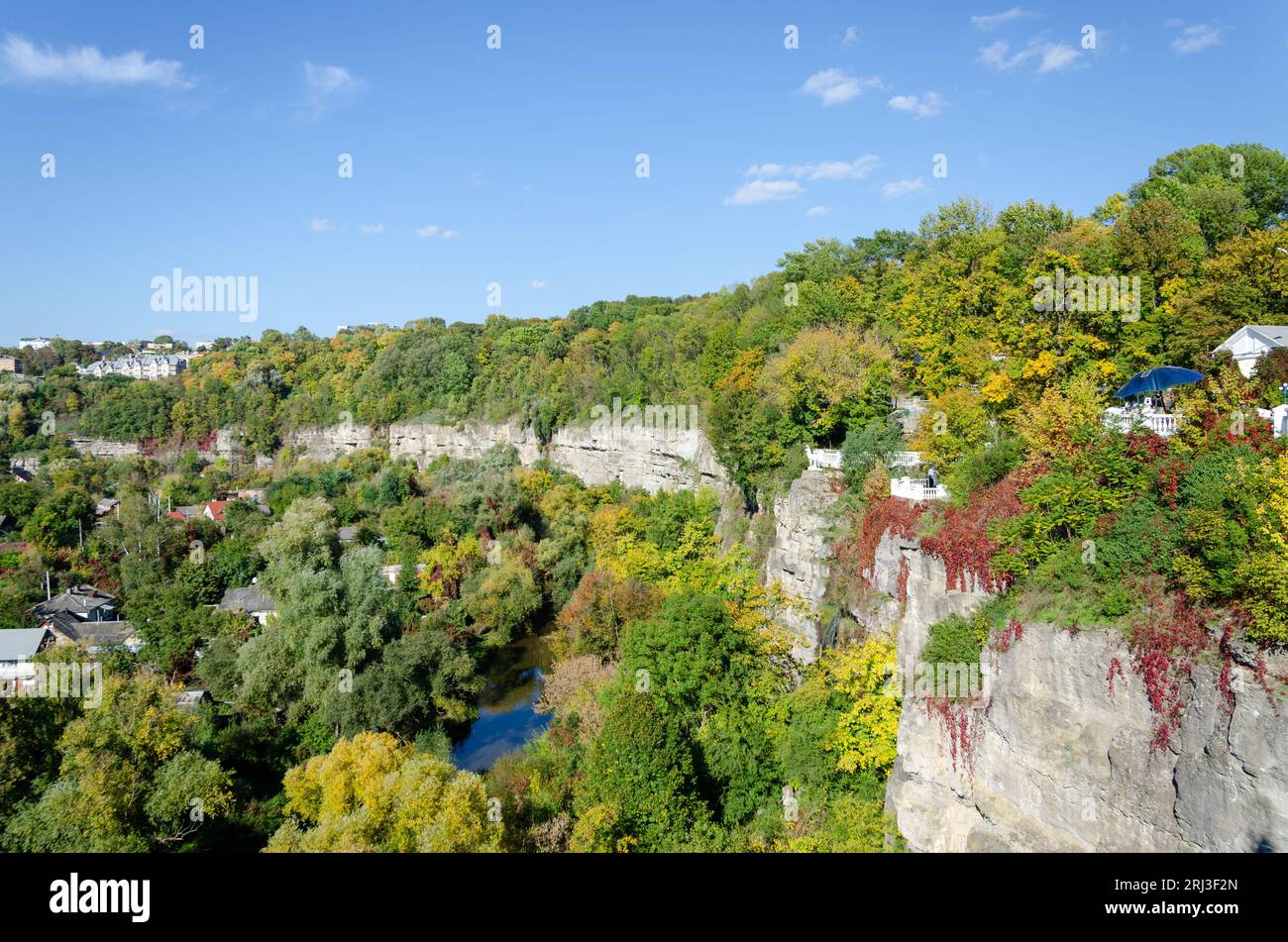 A stunning aerial view of a quaint village nestled in the valley below ...