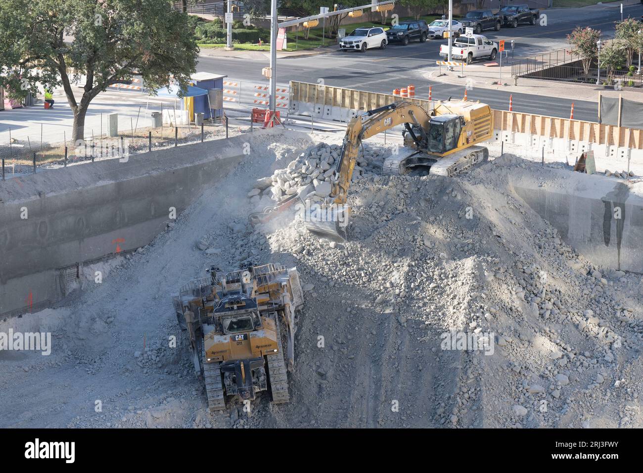 Texas construction crews work to dig foundations for two new five and ...