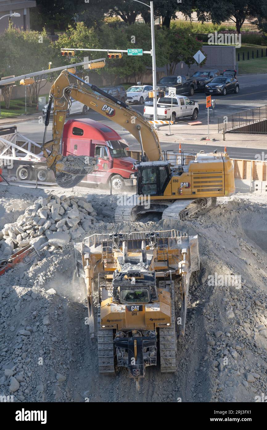 Texas construction crews work to dig foundations for two new five and ...