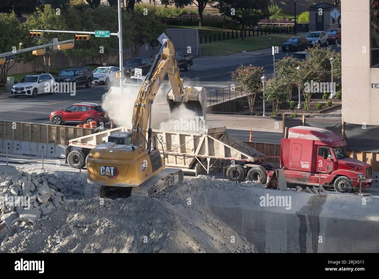 Texas construction crews work to dig foundations for two new five and ...