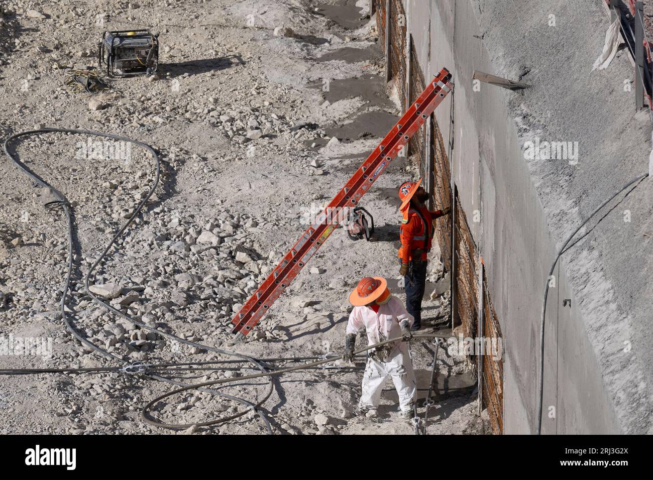 Texas construction crews work to dig foundations for two new five and ...