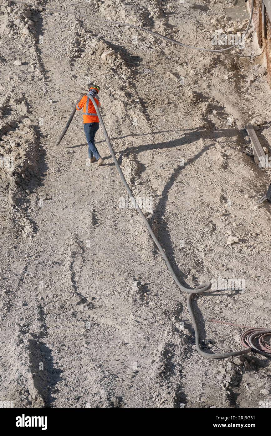 Texas construction crews work to dig foundations for two new five and ...