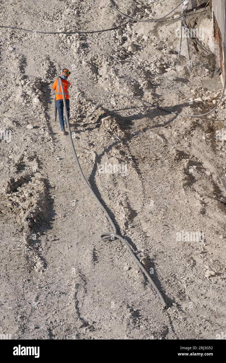 Texas construction crews work to dig foundations for two new five and ...