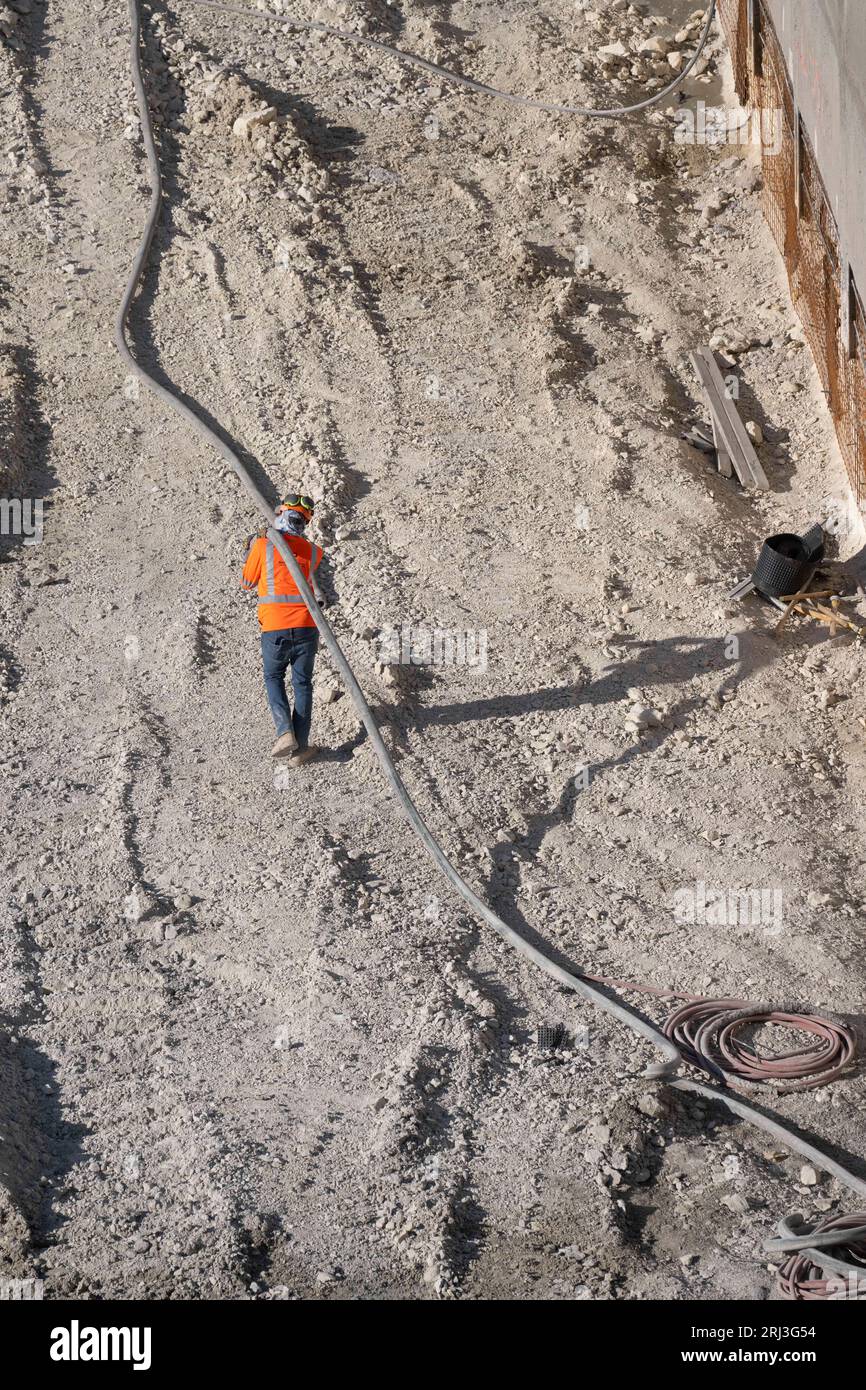 Texas construction crews work to dig foundations for two new five and ...