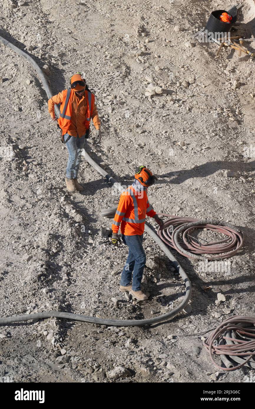 Texas construction crews work to dig foundations for two new five and ...