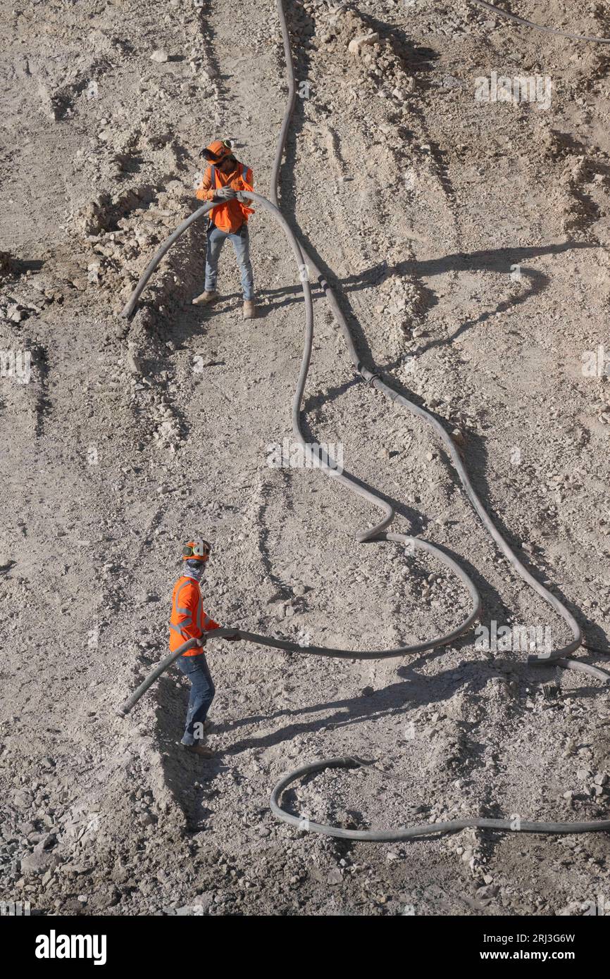 Texas construction crews work to dig foundations for two new five and ...