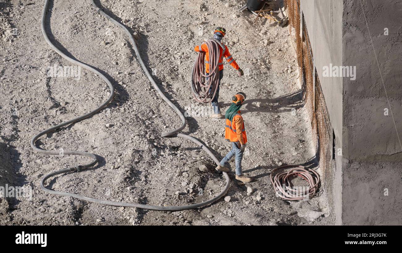 Texas construction crews work to dig foundations for two new five and ...