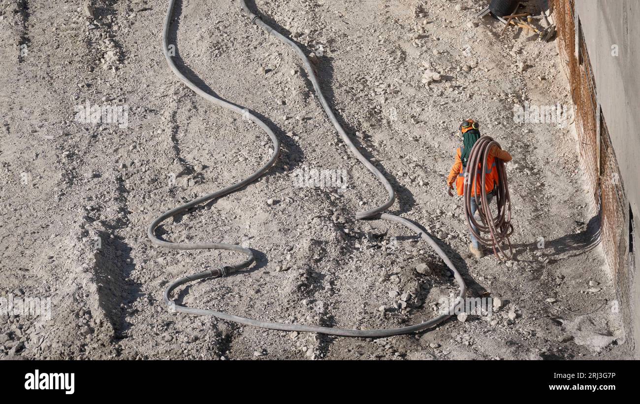 Texas construction crews work to dig foundations for two new five and ...