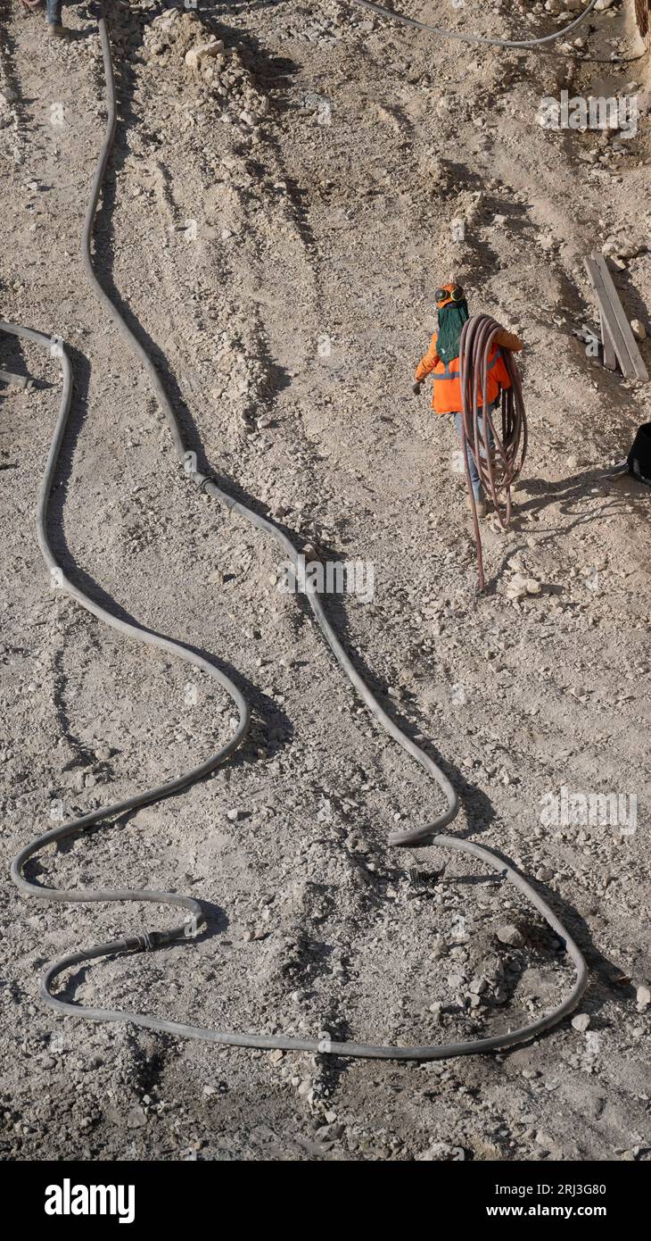 Texas construction crews work to dig foundations for two new five and ...