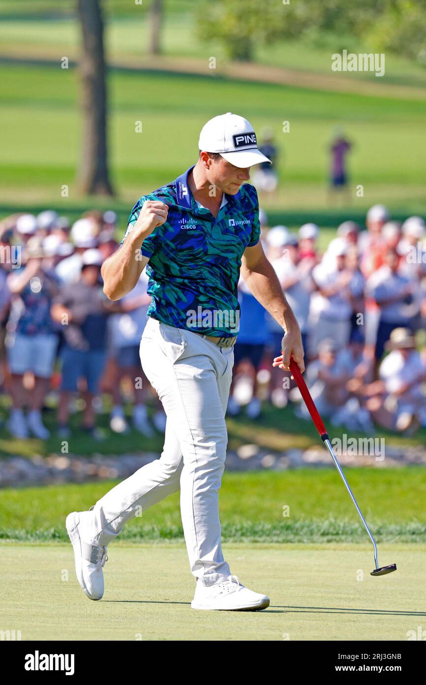 OLYMPIA FIELDS, IL - AUGUST 20: PGA golfer Viktor Hovland reacts to making a birdie putt on the ...