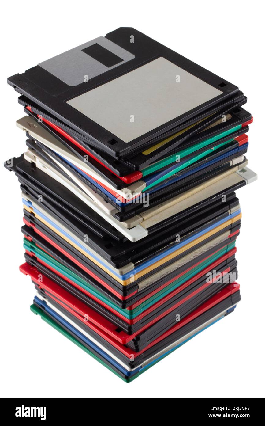 Colored old retro floppy diskettes in stack. Isolated on white ...